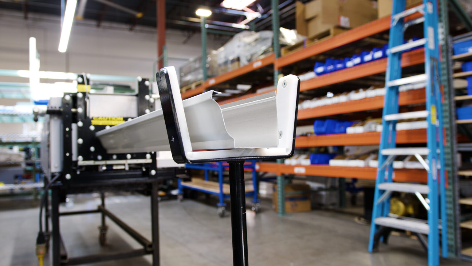 How to Set Up a Run-Out Stand for an NTM Gutter Machine